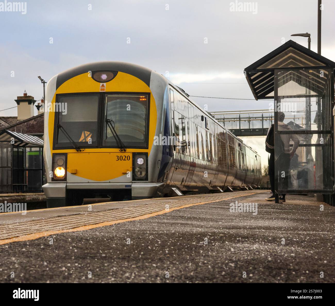Diesel train CAF 3000 series pulling up at platform Northern Ireland ...