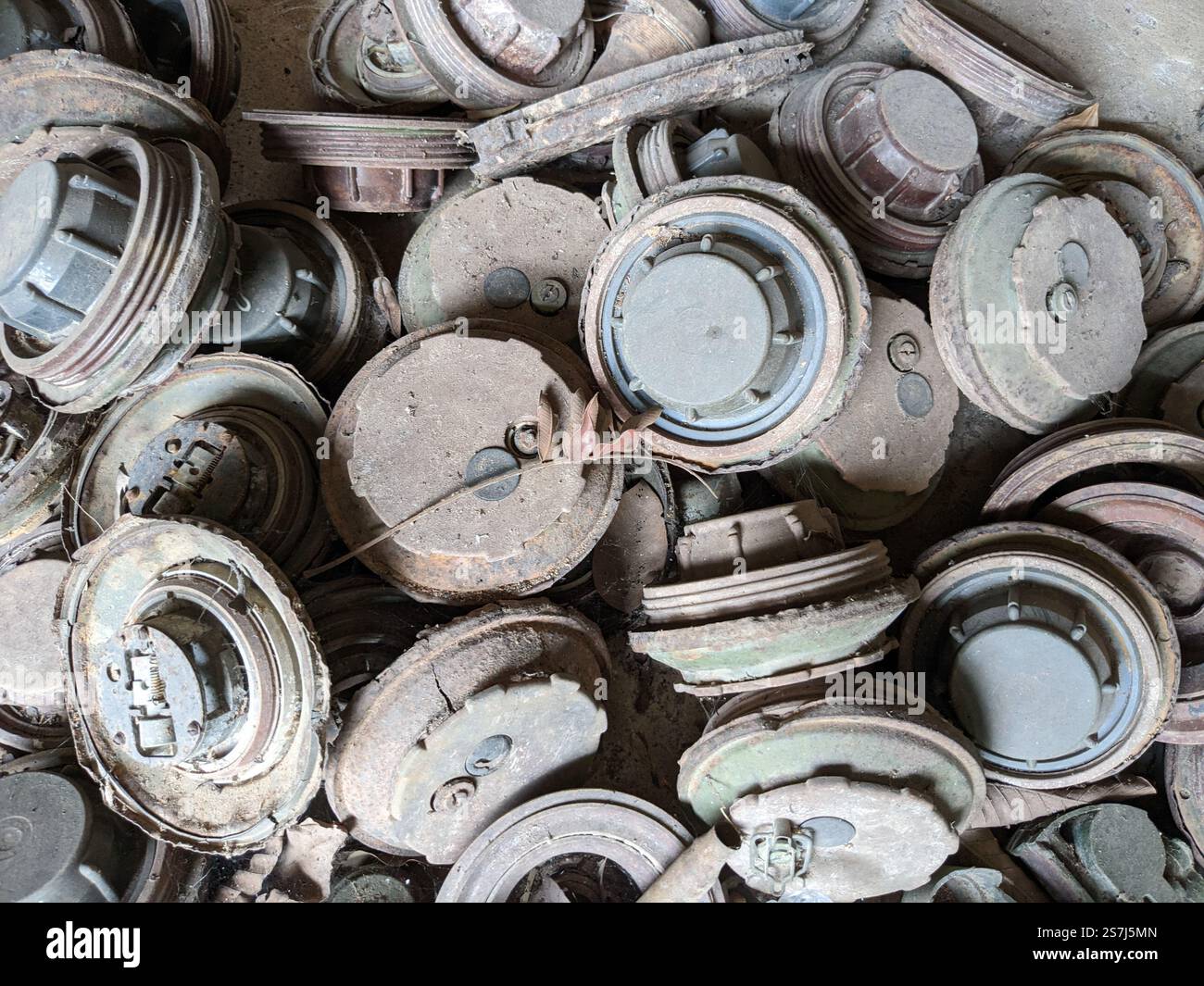 unexploded land mines and cluster bombs remains picked up all around ...