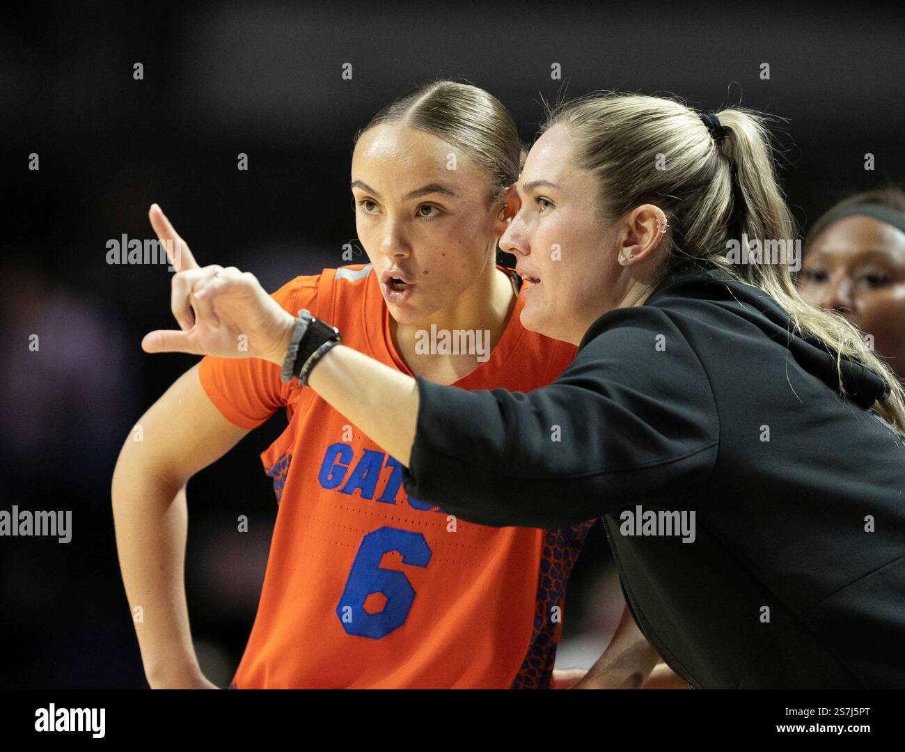 Florida head coach Kelly Rae Finley talks with Florida guard Kenza ...