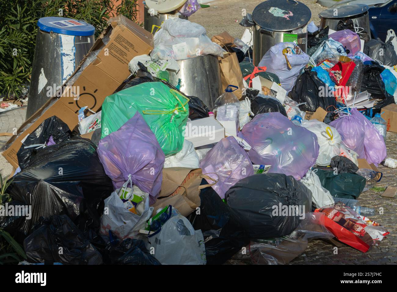 LISBON, PORTUGAL - DECEMBER 26, 2024: Garbage Piling Up near Recycling ...