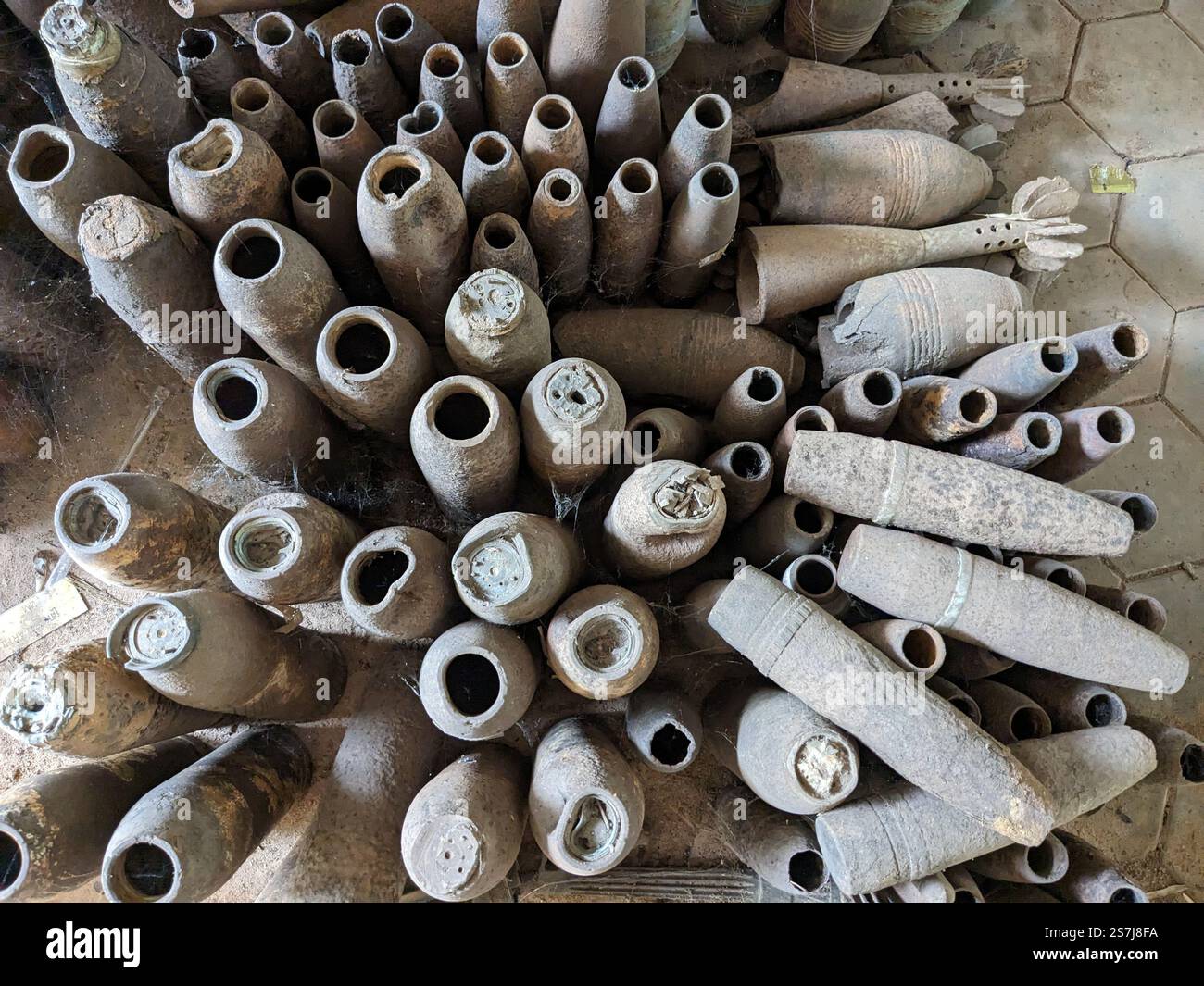 unexploded land mines and cluster bombs remains picked up all around ...