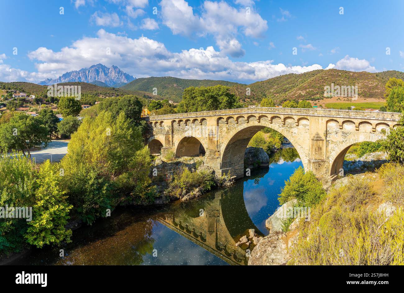 Landscape with Ponte Leccia village and Monte Cinto in Corsica island ...