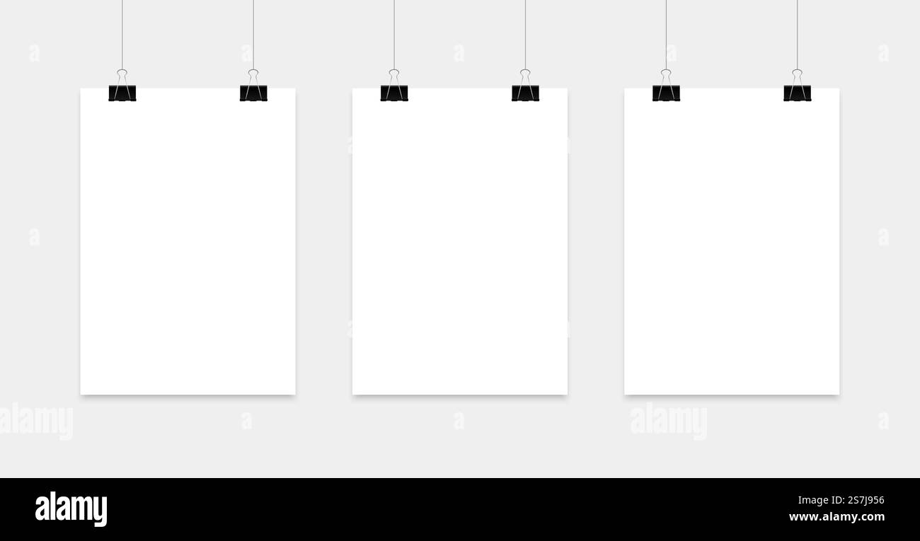 Blank poster hanging on clips. A4 paper page In portrait formats ...