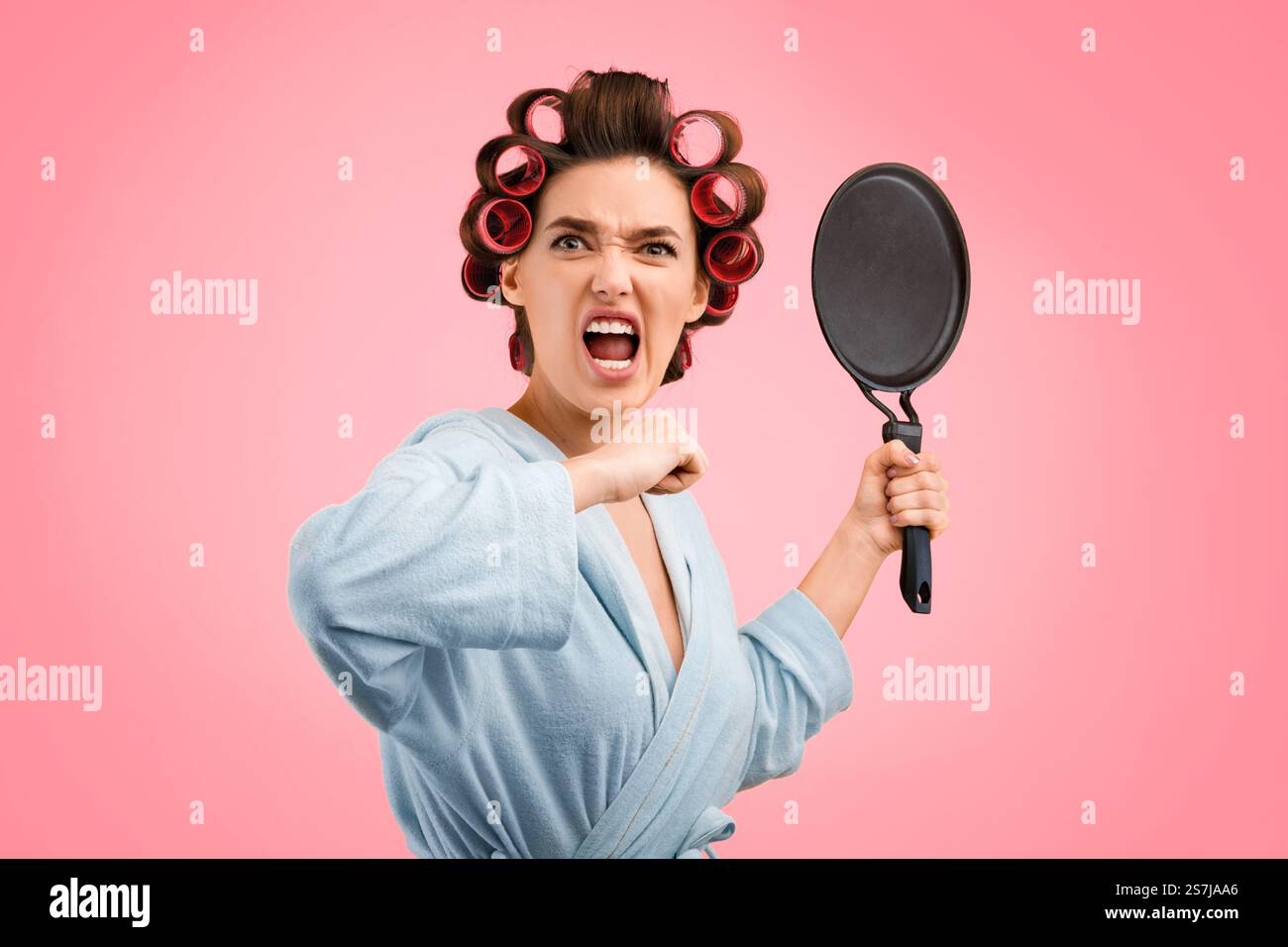 Angry Woman Shouting Holding Frying Pan Over Yellow Studio Background ...