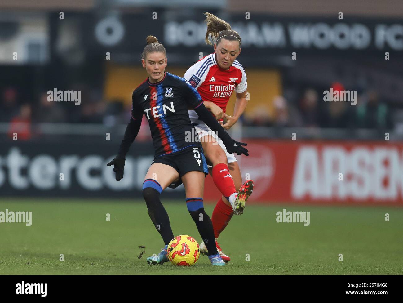 My Cato is tickled by Katie McCabe of Arsenal during the Barclays FA ...
