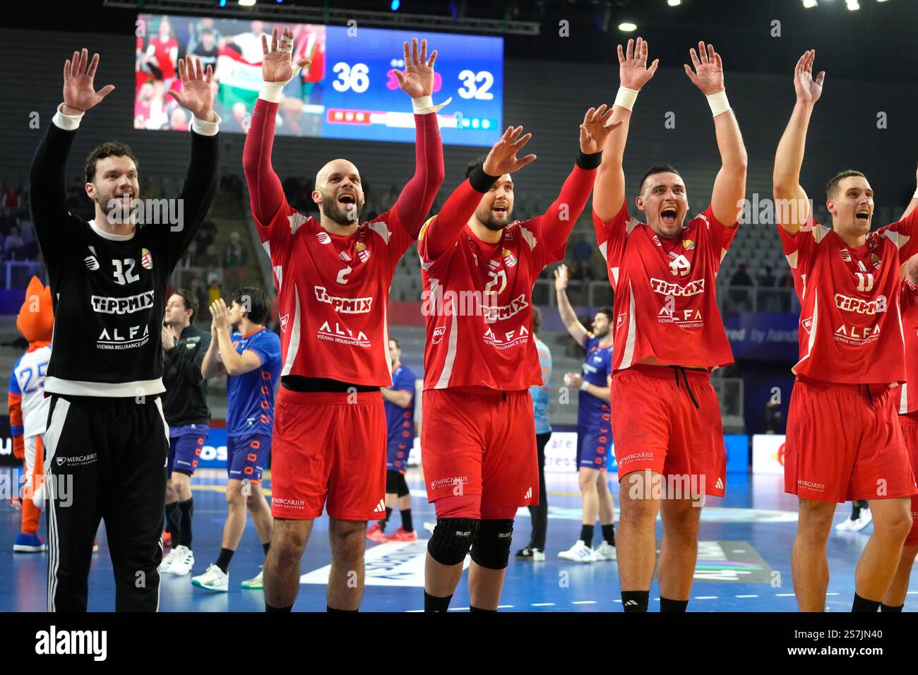 Hungary players celebrate at the end of the preliminary round group D ...