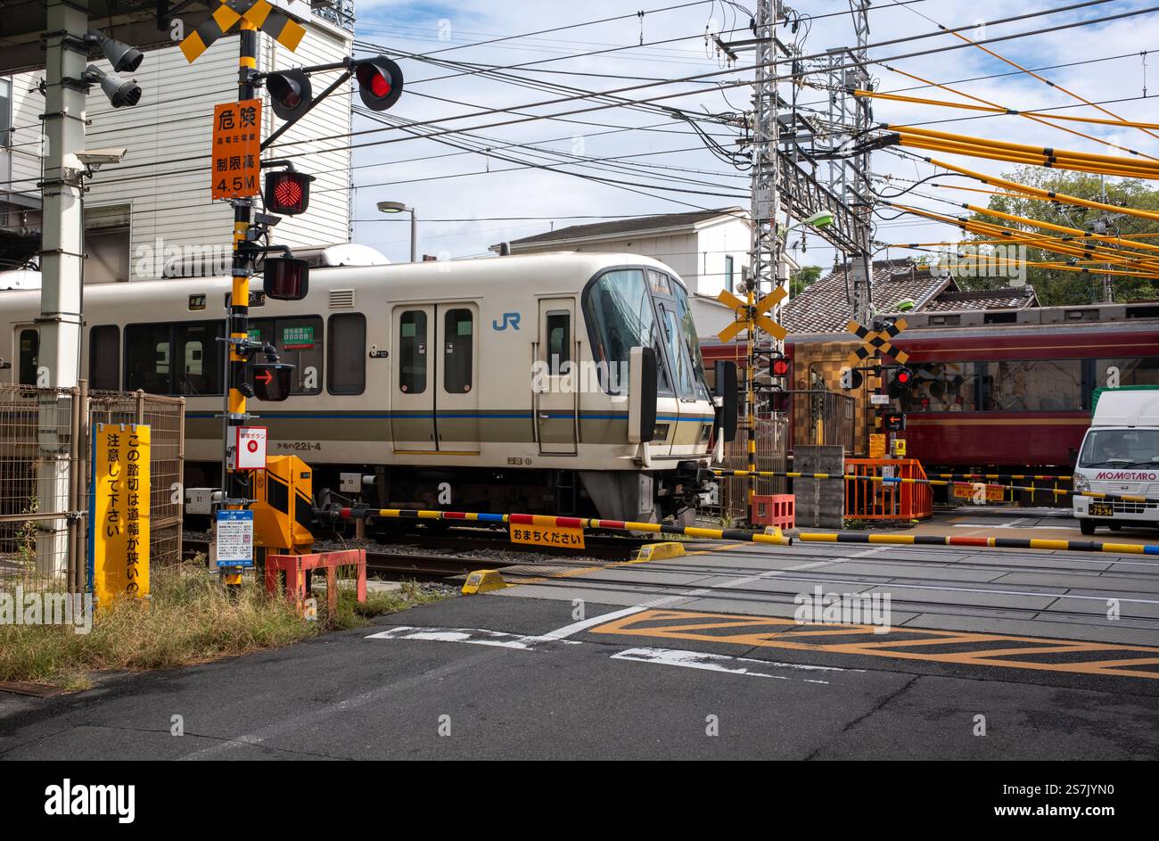 Trains Passing at the Level Crossing Railway at Tofukuji Station in ...