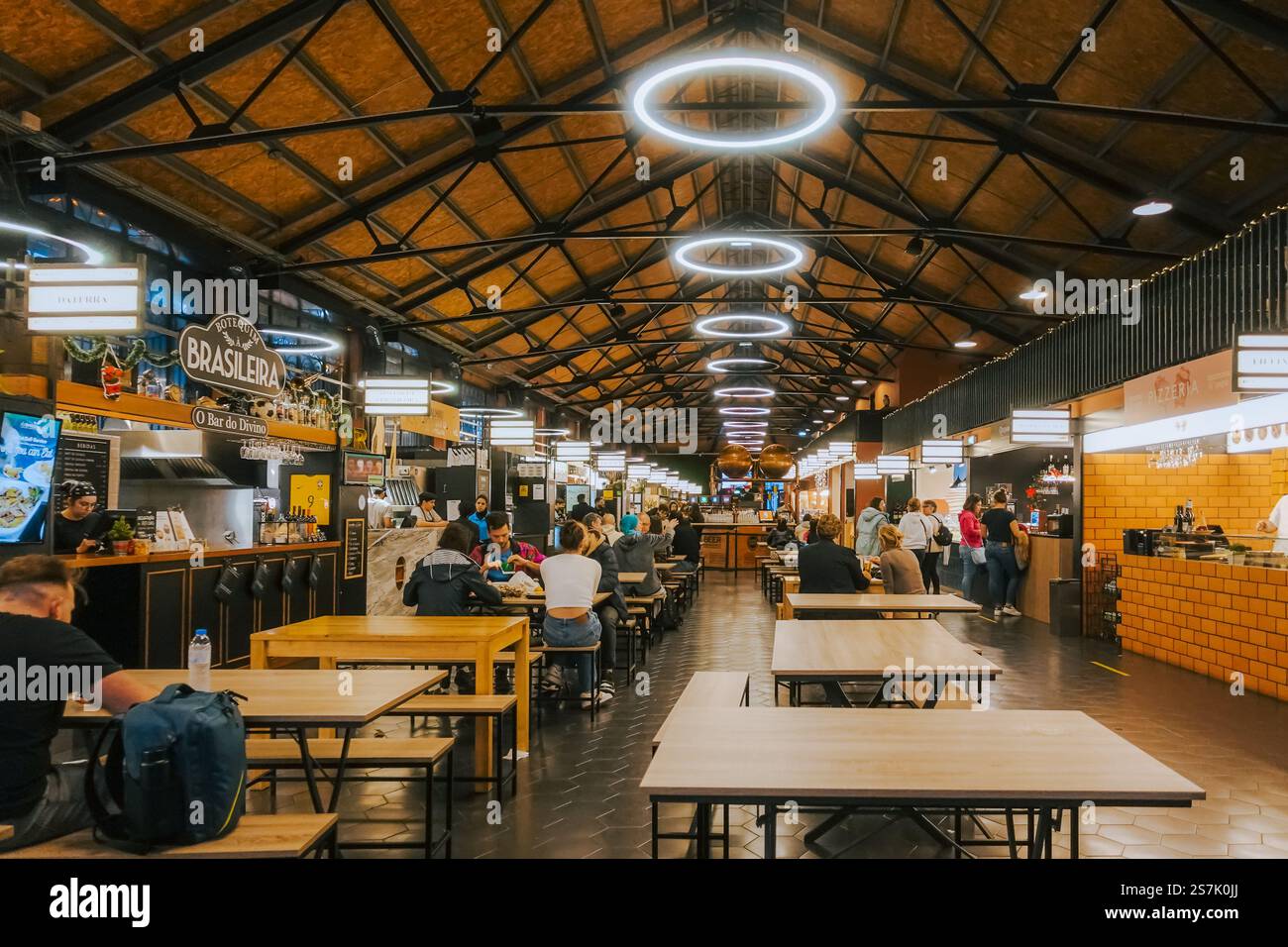 Interior of a local food court in Gaia, Portugal, with various food ...