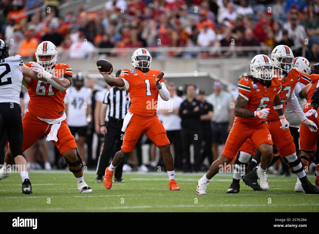 Miami quarterback Cam Ward (1) throws for a 33-yard touchdown against ...