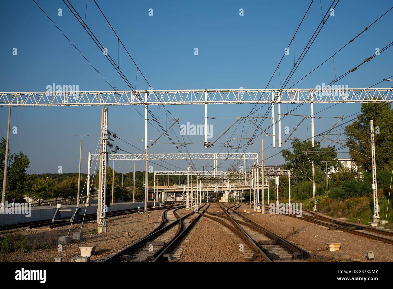 Railway Tracks with Overhead Power Lines Stock Photo - Alamy