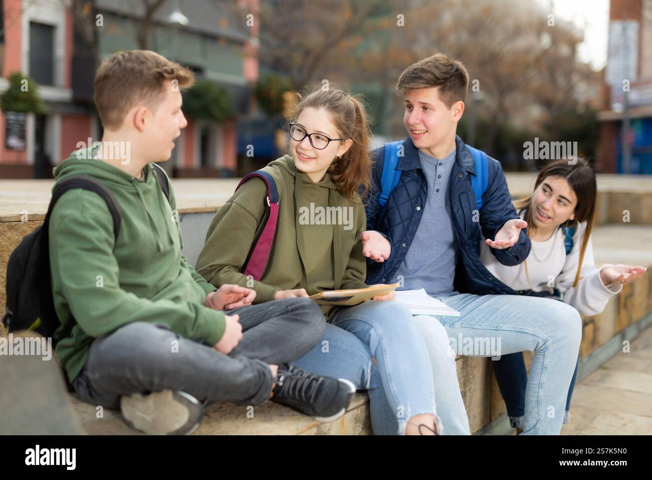 Group of positive teenagers having fun together Stock Photo - Alamy