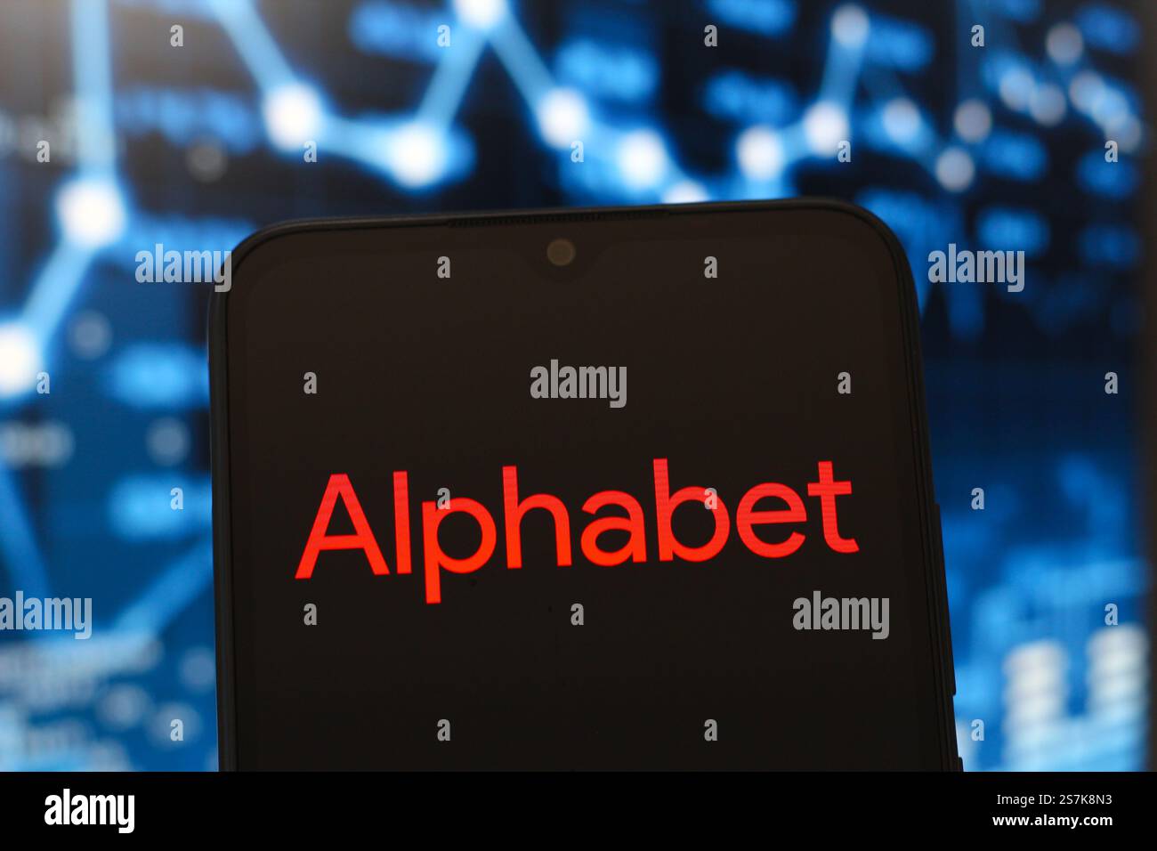 In this photo illustration, the Alphabet, Inc. logo is seen displayed ...