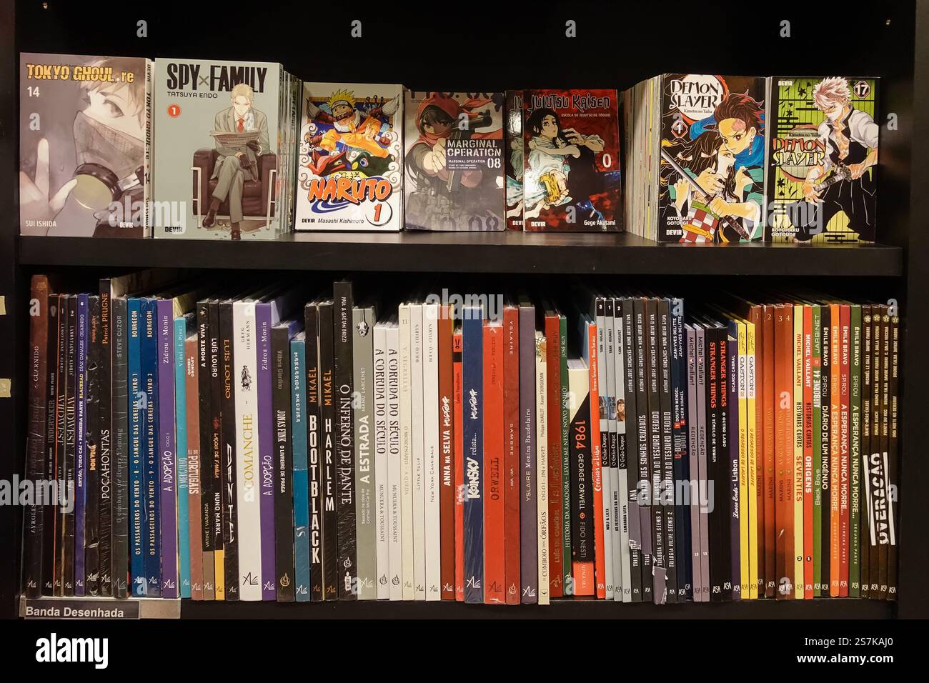 A selection of manga and comic books written in Portuguese displayed ...