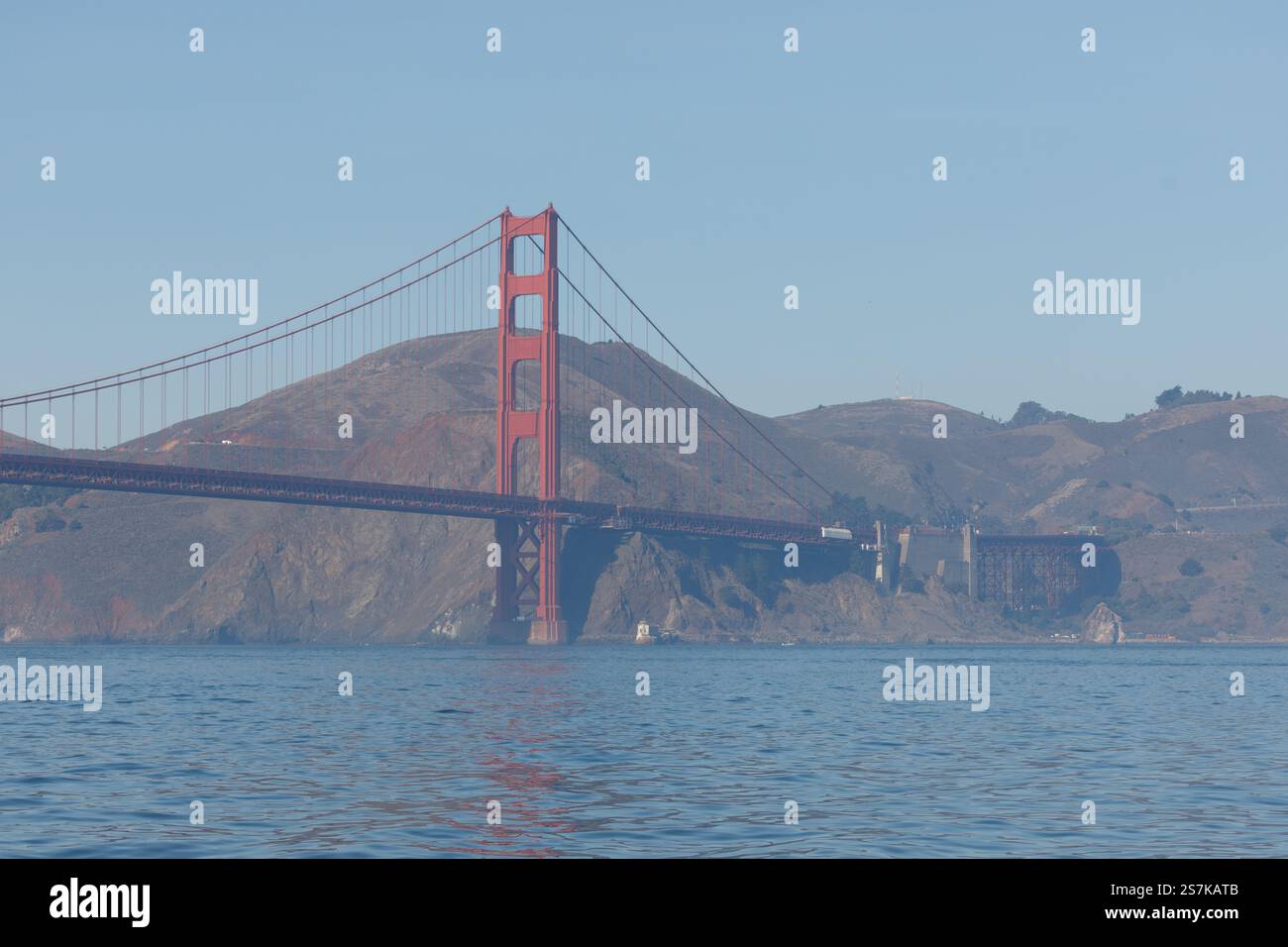 Long span of Golden Gate Bridge stretches across the waters of the San ...