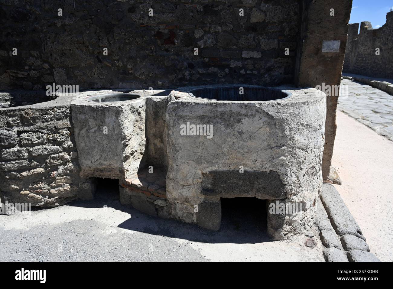 Historic street of Ancient roman shops in the city of Pompeii Italy ...