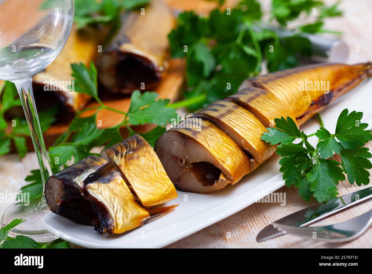 Smoked scomber with fresh parsley Stock Photo - Alamy