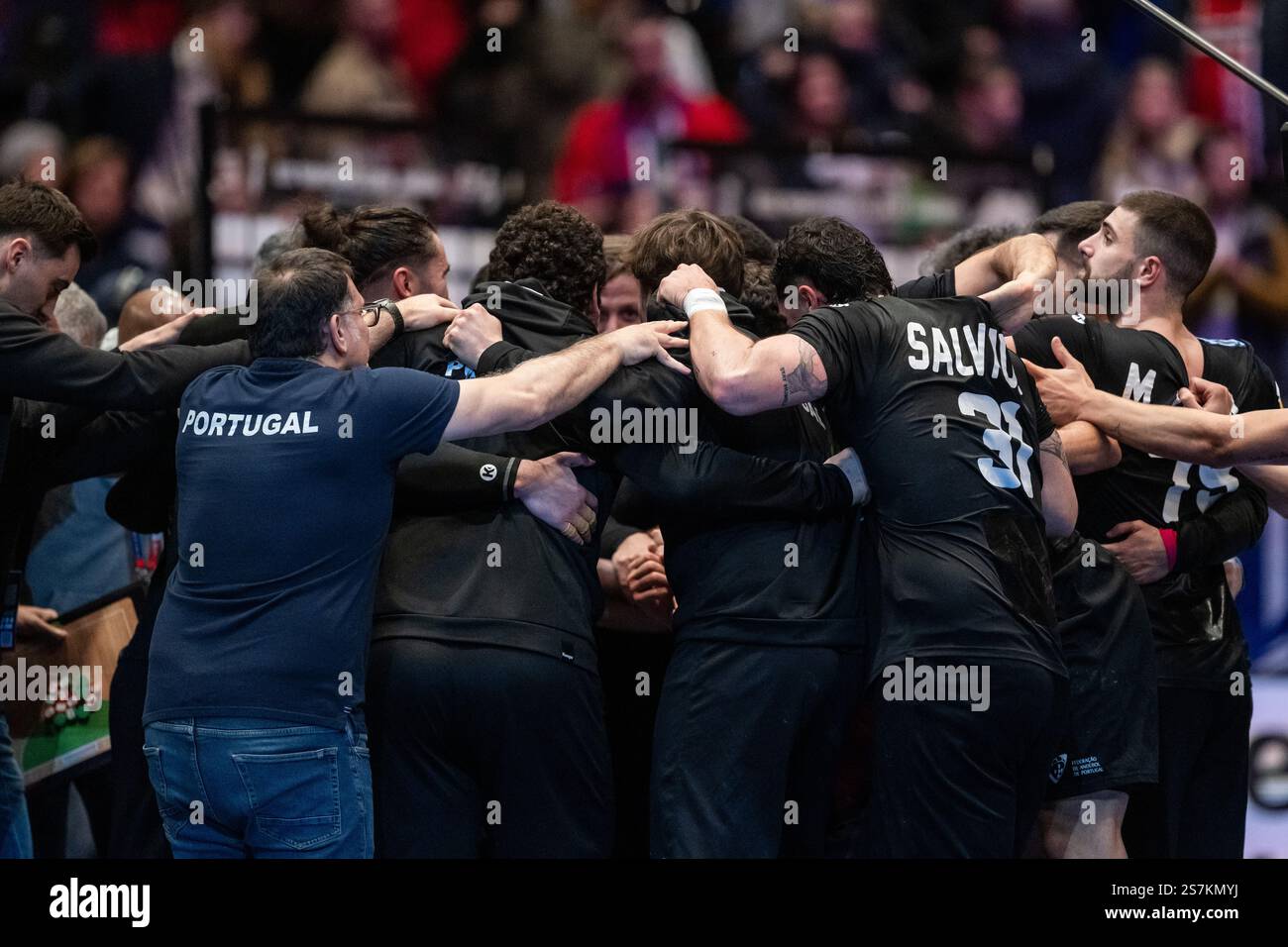 Players of, Portugal. , . celebrate after the 2025 IHF World Men's ...