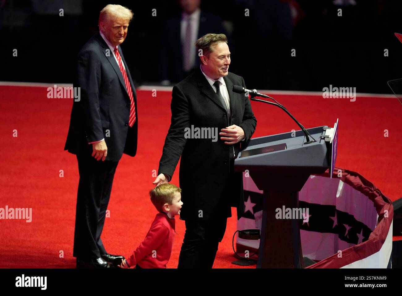 FILE - Elon Musk, with his son X Æ A-Xii, speaks as President-elect ...