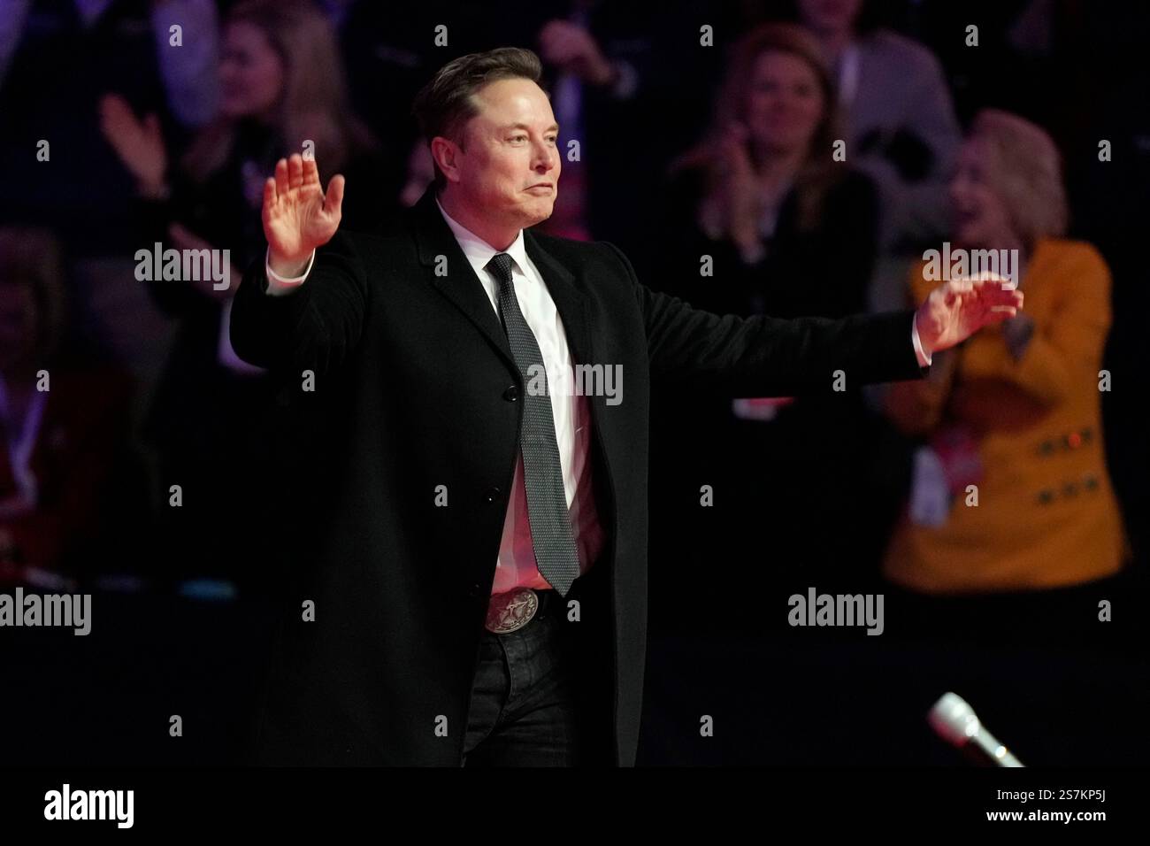 Elon Musk arrives as President-elect Donald Trump speaks at a rally ...