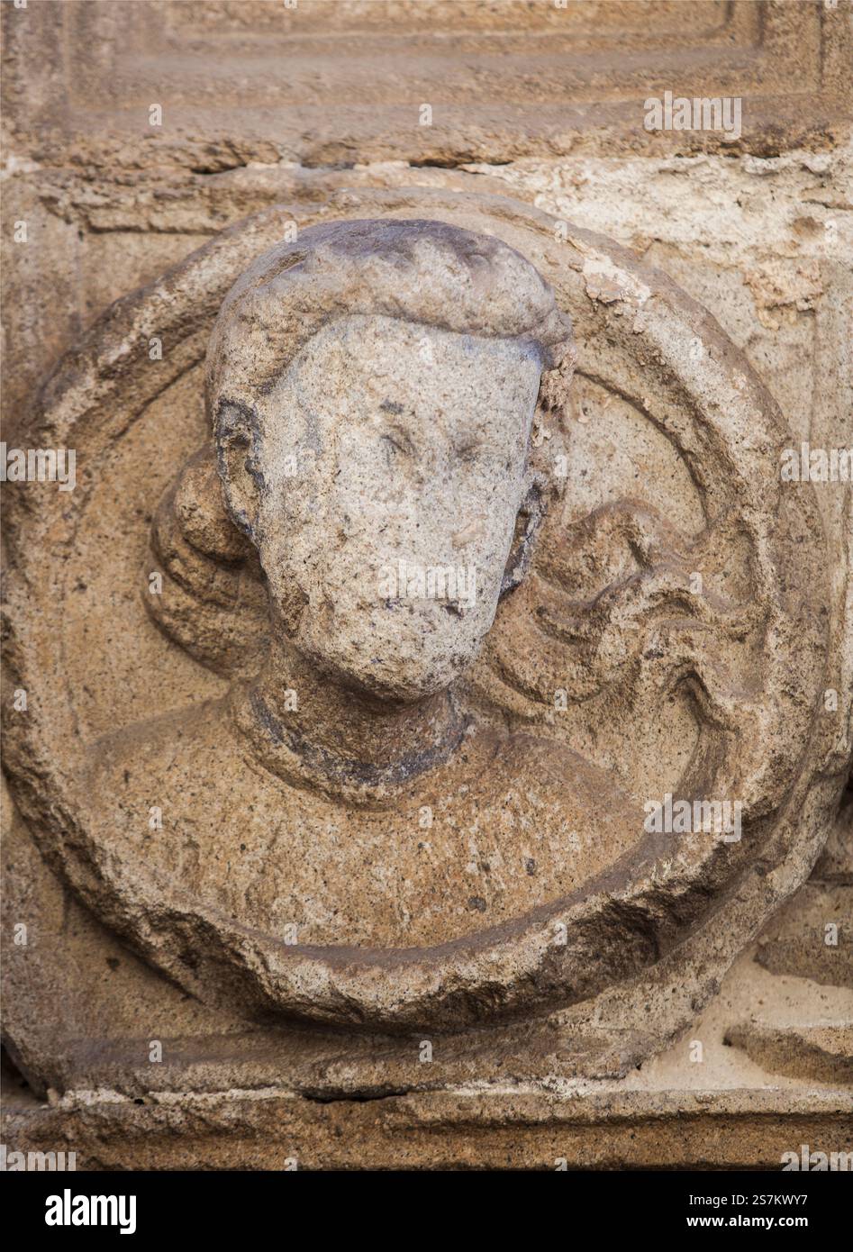 Female weathered high relief bust. Facade of Carvajal House-Palace ...