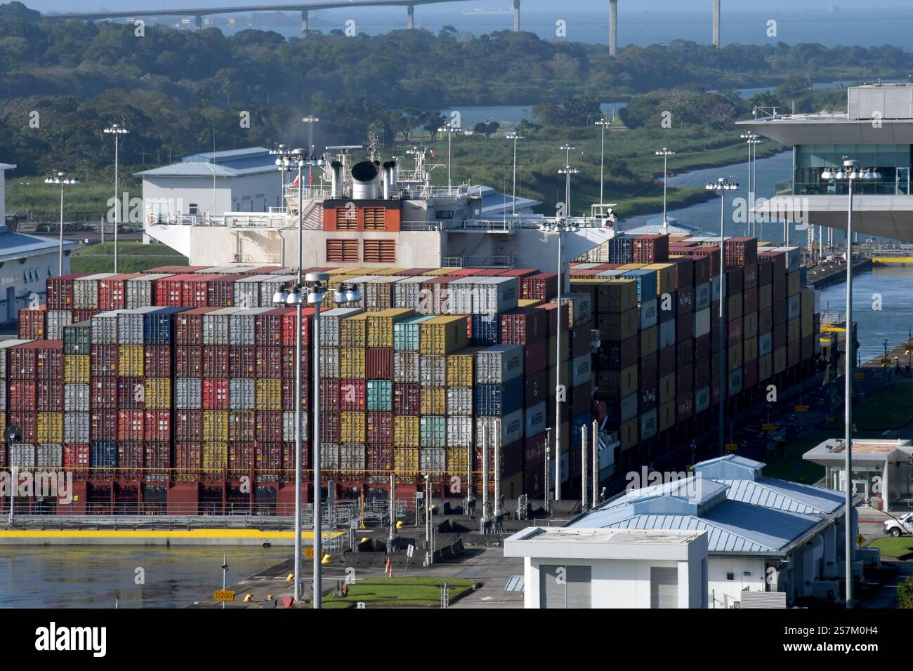 Colon, USA. 12th Jan, 2025. Lock gates slide closed behind a "Panamax ...
