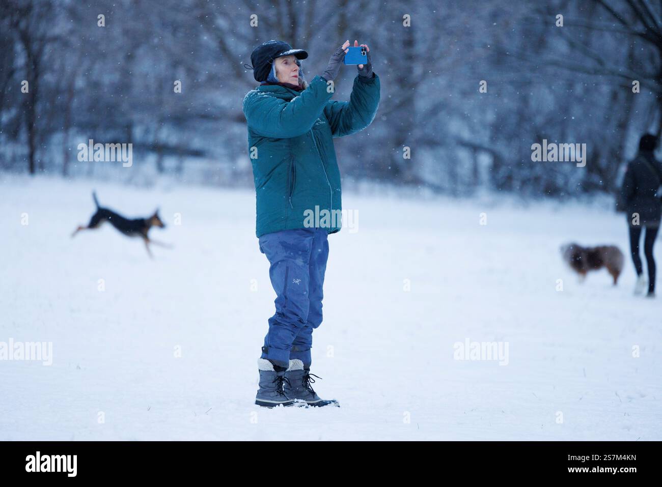 Washington, United States. 19th Jan, 2025. A person takes a photo as ...