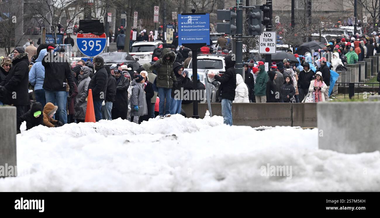 Supporters of U.S. President-elect Donald Trump head to a rally prior ...