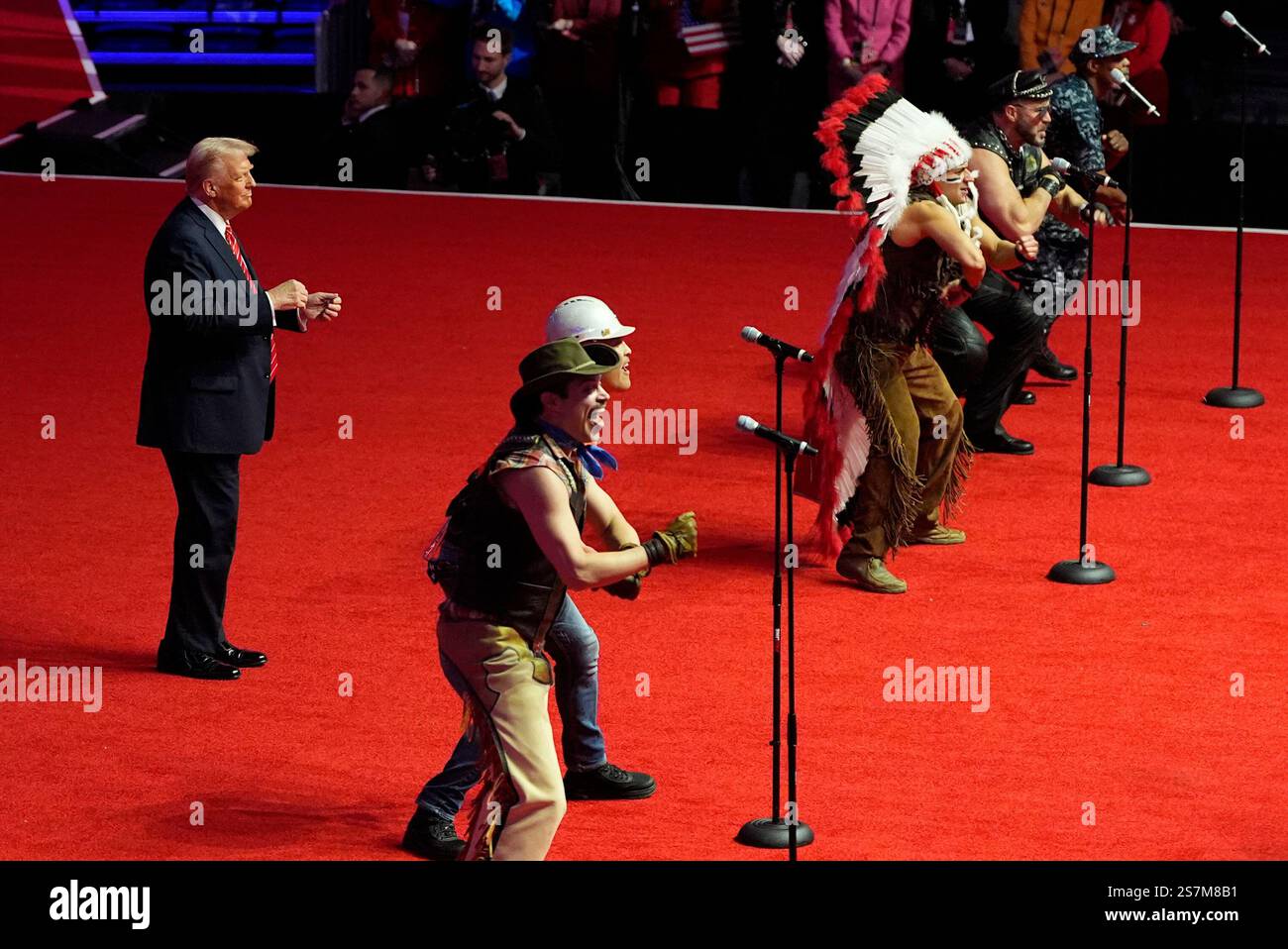President-elect Donald Trump, left, dances as the Village People ...