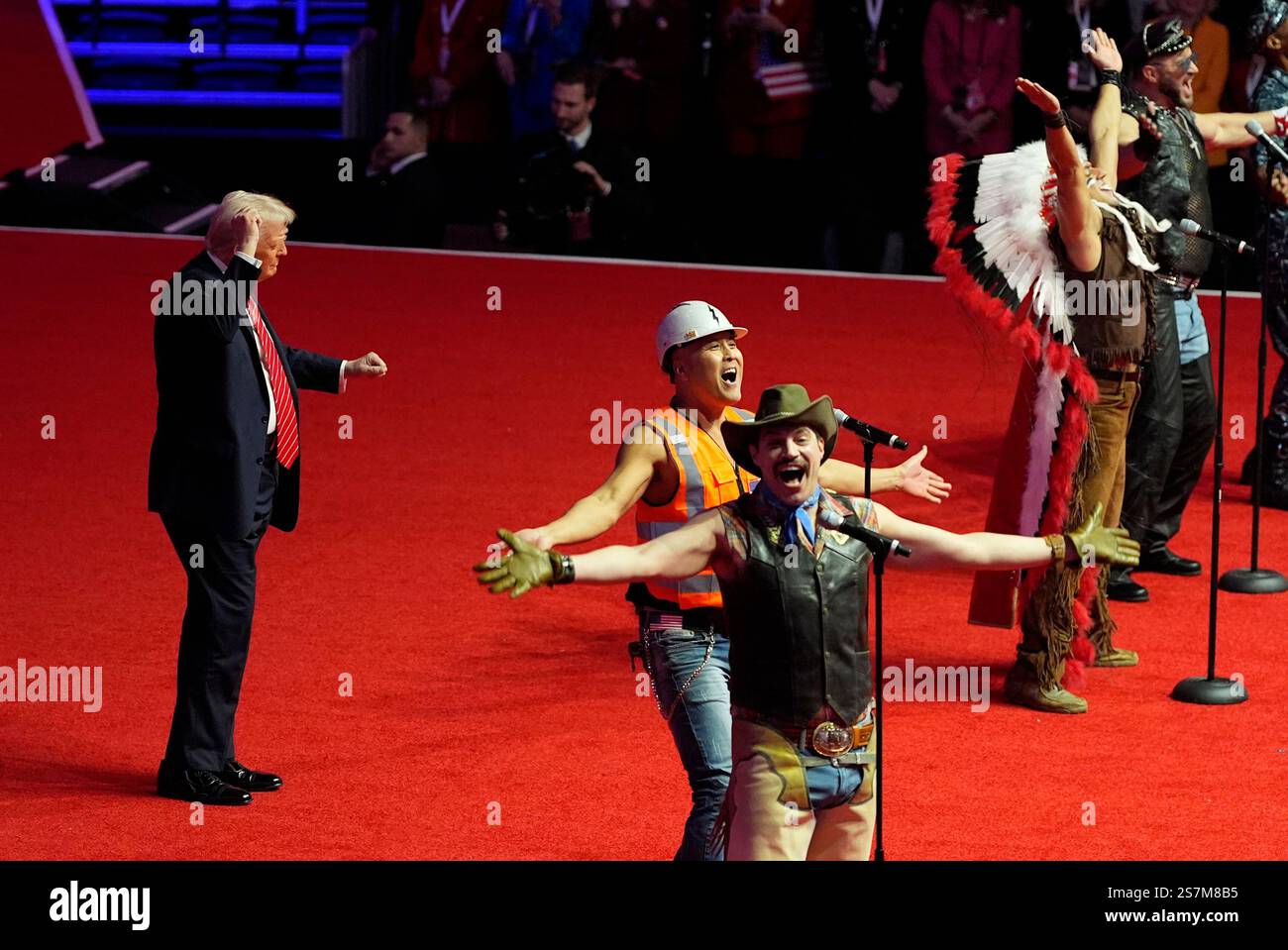 President-elect Donald Trump, left, dances as the Village People ...
