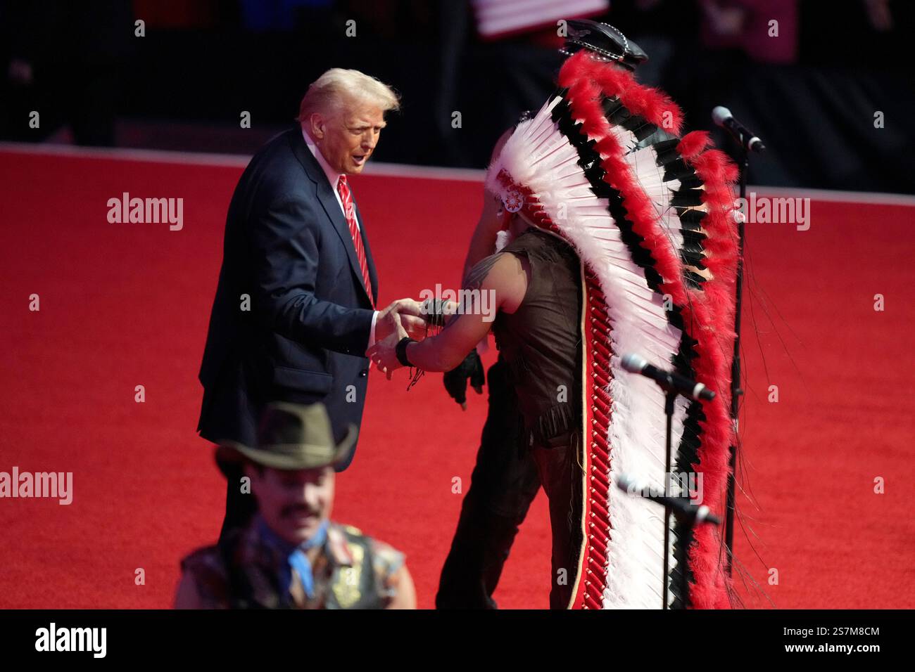 President-elect Donald Trump, left, greets a member of the Village ...
