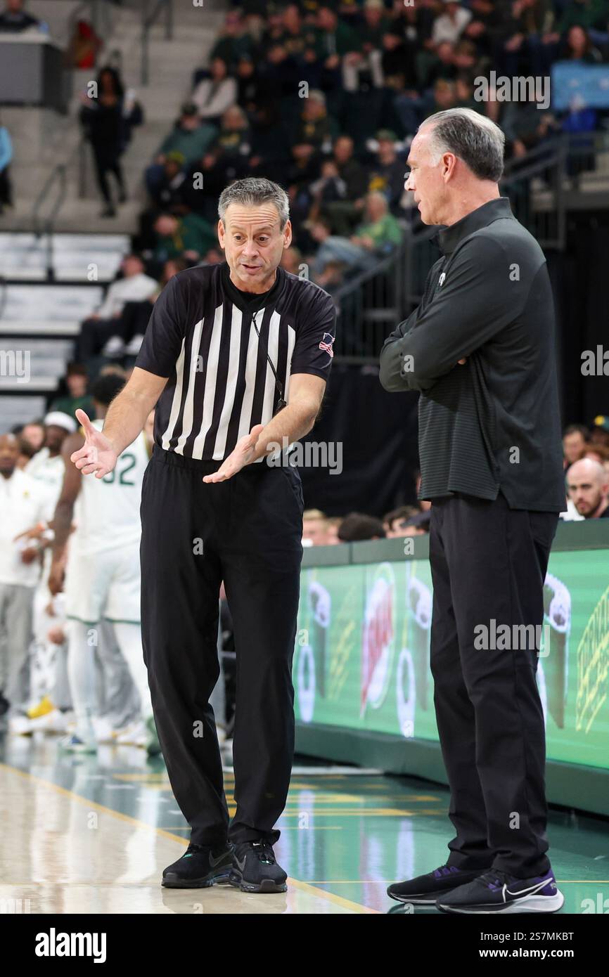 WACO, CA - JANUARY 19: The referee talks to TCU Horned Frogs head coach Jamie Dixon about coming ...