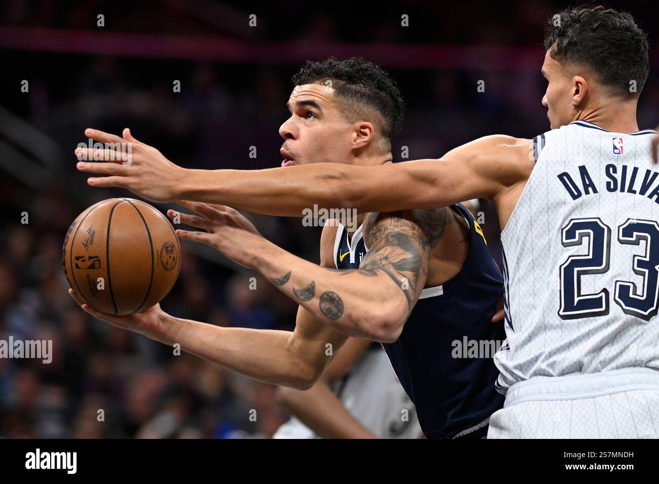 Denver Nuggets forward Michael Porter Jr., left, goes up to shoot as ...