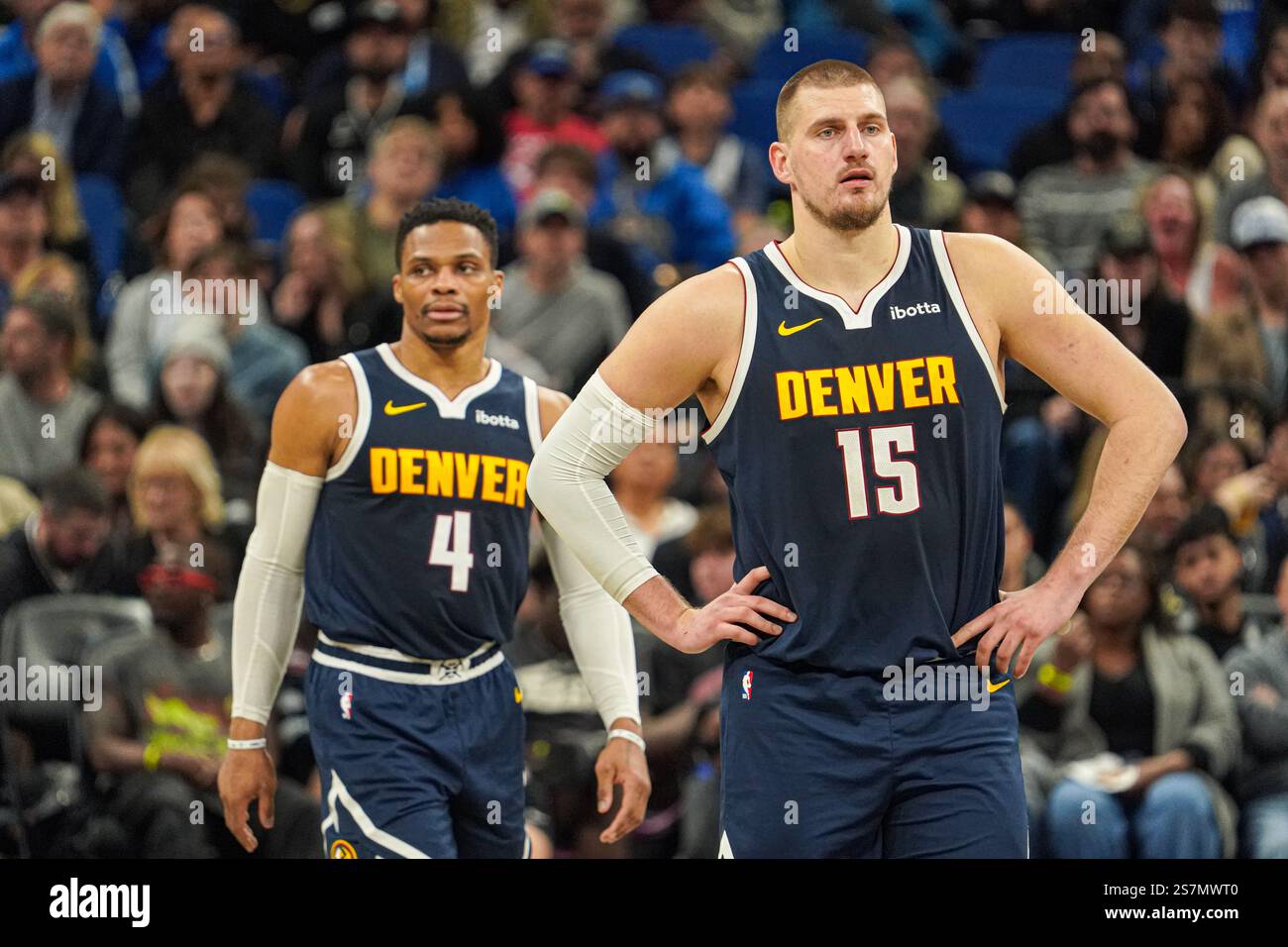 Orlando, Florida, USA, January 19, 2025, Denver Nuggets players Nikola Jokic #15 and Russell ...