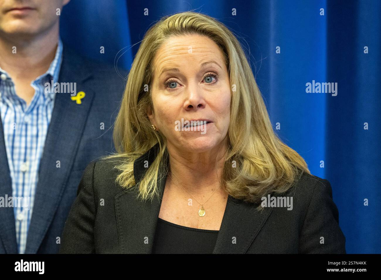 Congresswoman Laura Gillen speaks during briefing by U. S. Senator ...