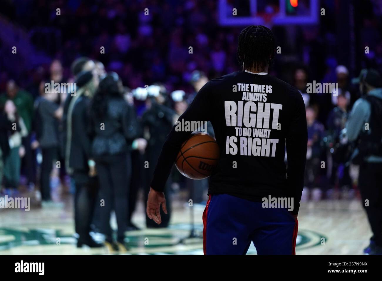 Philadelphia 76ers' Jeff Dowtin Jr. pauses for a performance of Lift ...