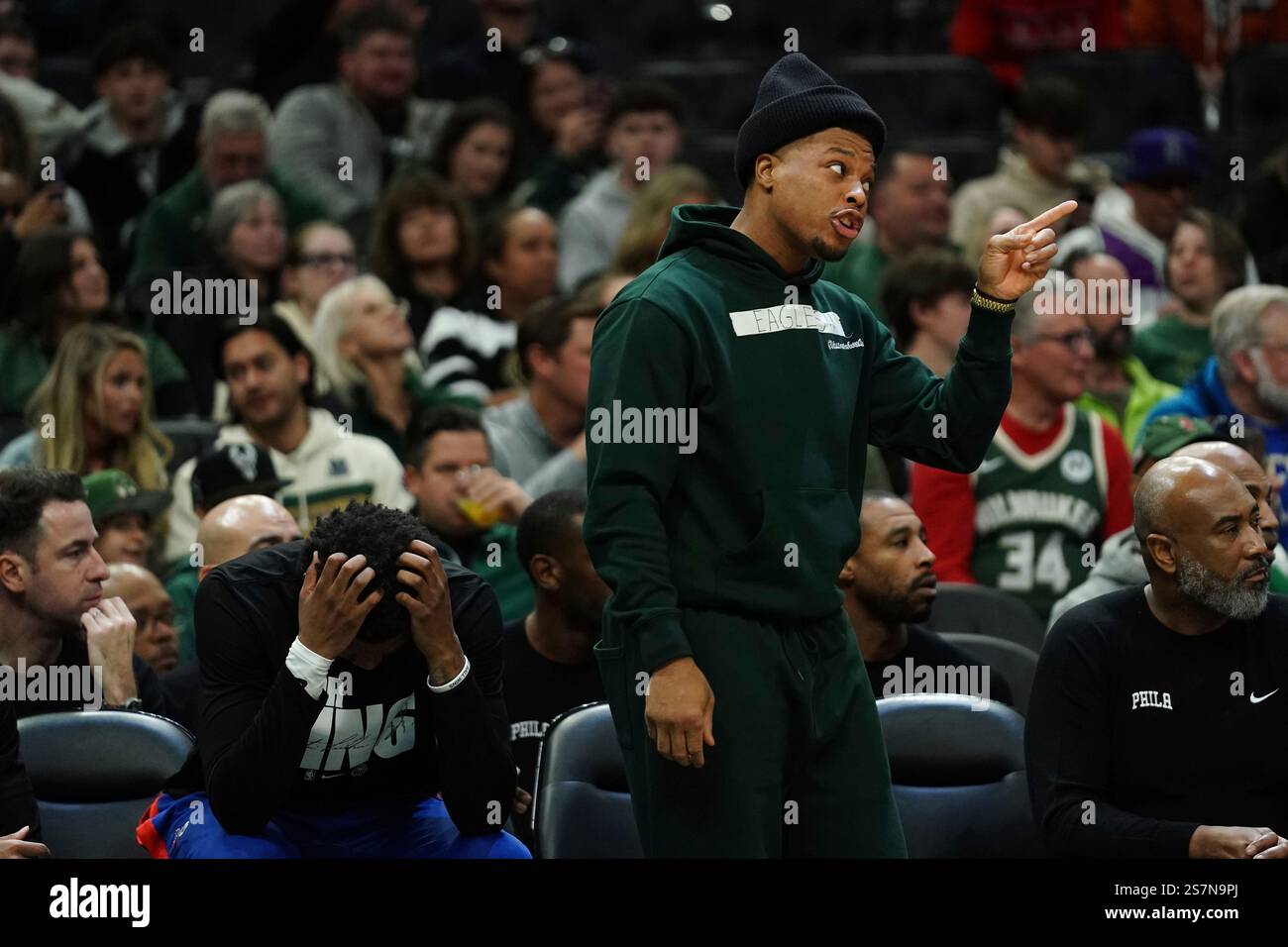 Philadelphia 76ers' Kyle Lowry gestures from the bench during the first ...
