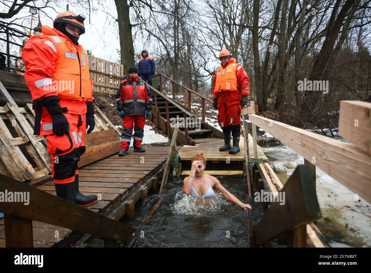 A woman seen during the Epiphany bathing in a font on the Bolshoi Pond. Epiphany bathing in ...