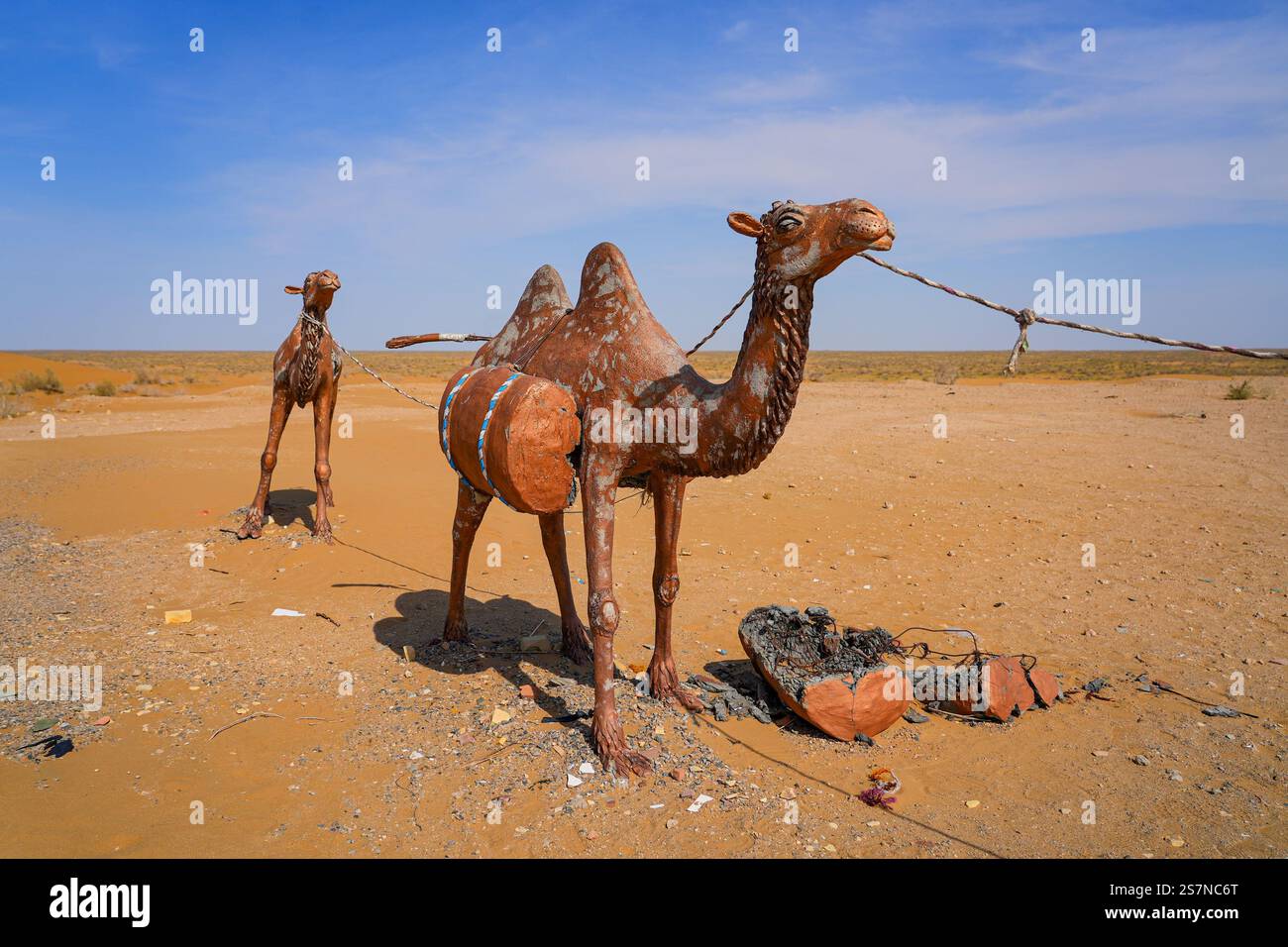 Sculpture of a camel train caravan along the ancient silk road at the gateway to the Khorezm ...