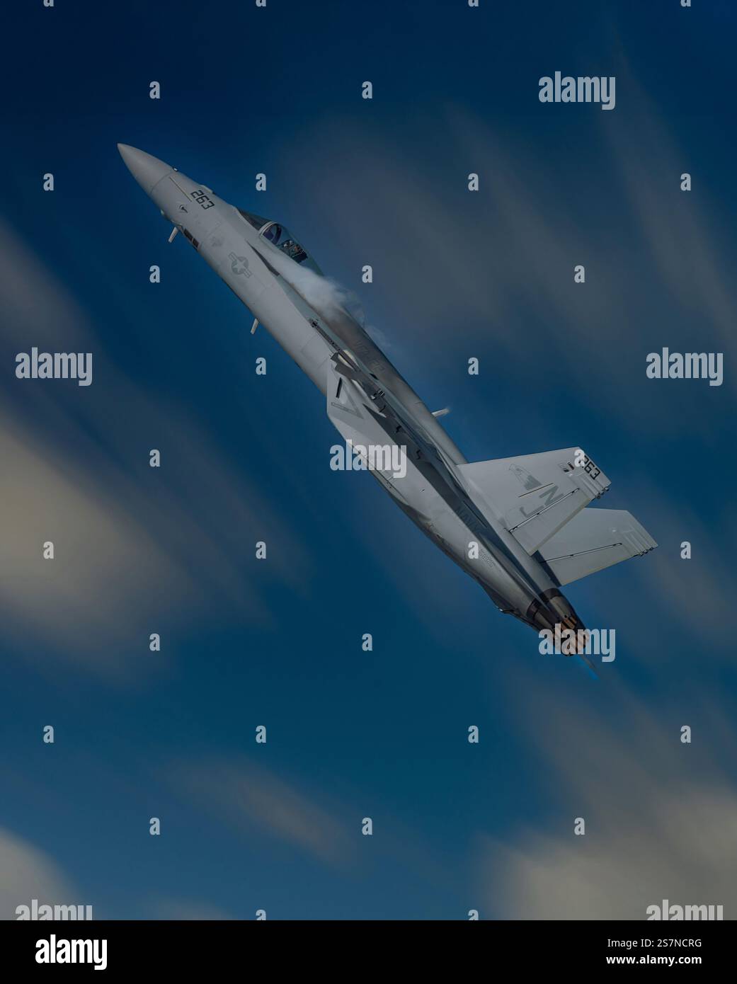 American Fighter Jet Flying Through Dramatic Clouds Stock Photo - Alamy