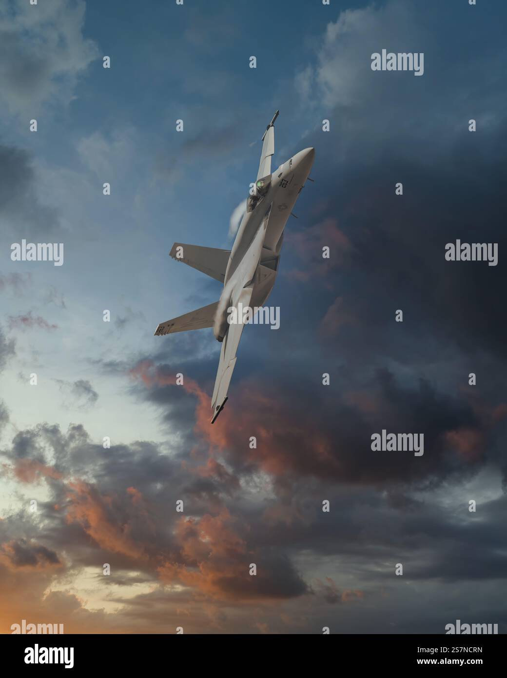 American Fighter Jet Flying Through Dramatic Clouds Stock Photo - Alamy