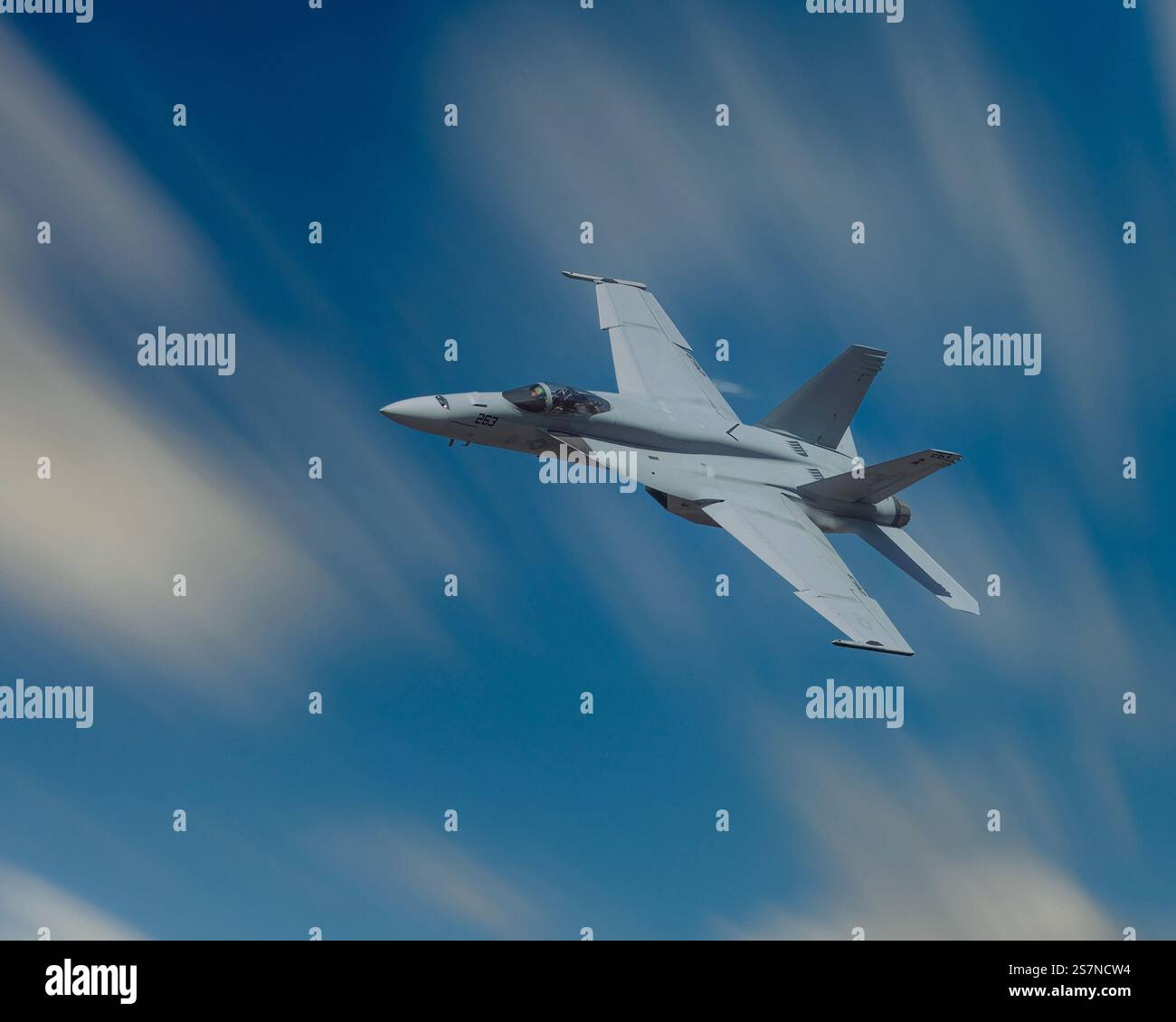 American Fighter Jet Flying Through Dramatic Clouds Stock Photo - Alamy