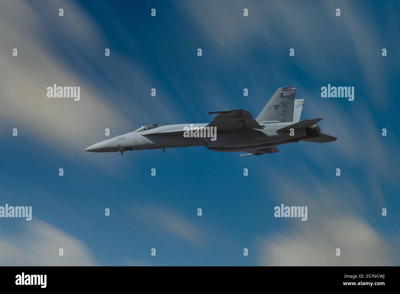 American Fighter Jet Flying Through Dramatic Clouds Stock Photo - Alamy