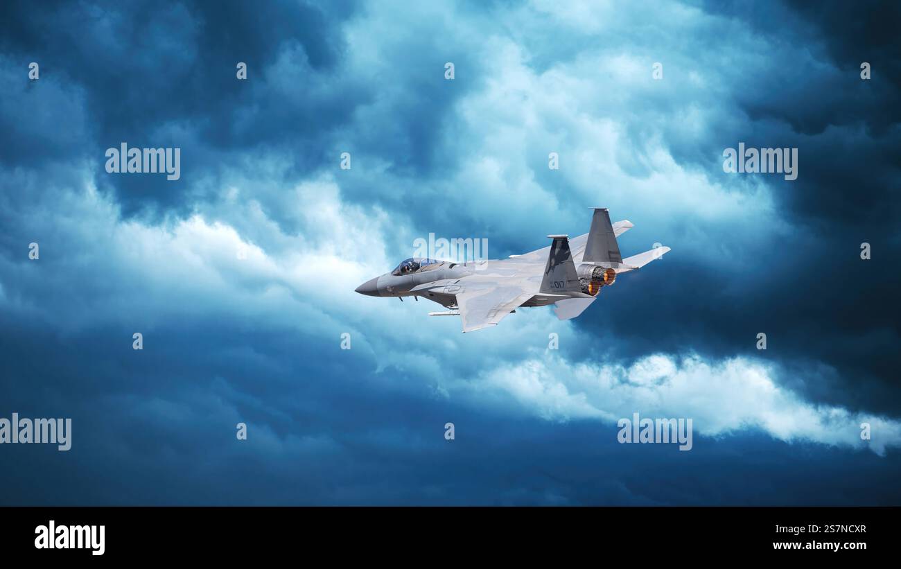 American Fighter Jet Flying Through Dramatic Clouds Stock Photo - Alamy