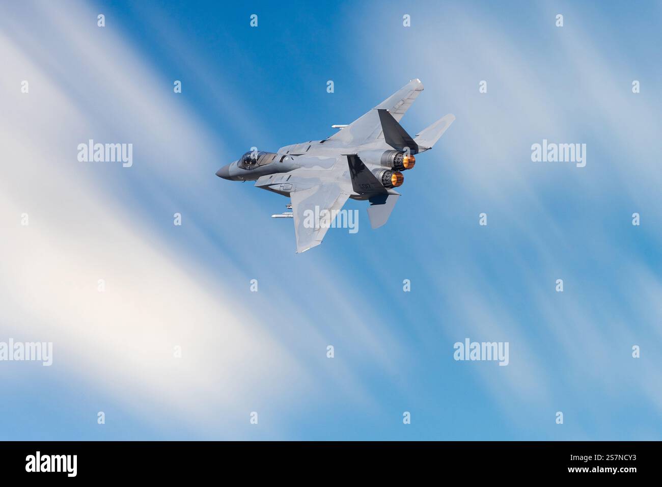 American Fighter Jet Flying Through Dramatic Clouds Stock Photo - Alamy