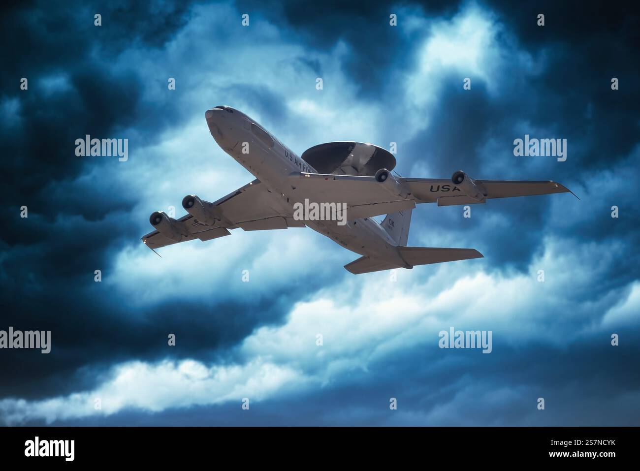 American Fighter Jet Flying Through Dramatic Clouds Stock Photo - Alamy