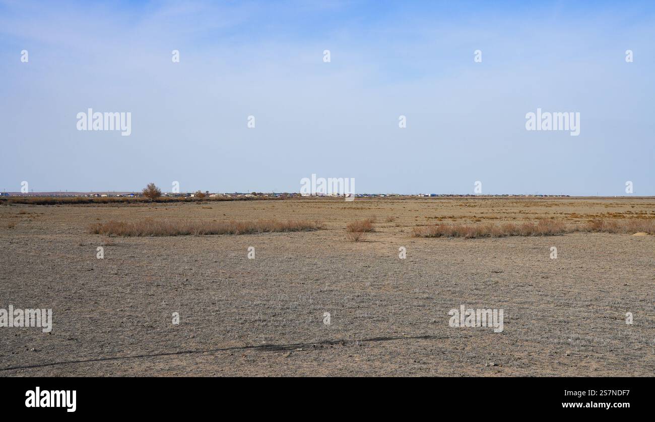 Moynaq skyline (Muynak), a former fishing village located on what used ...