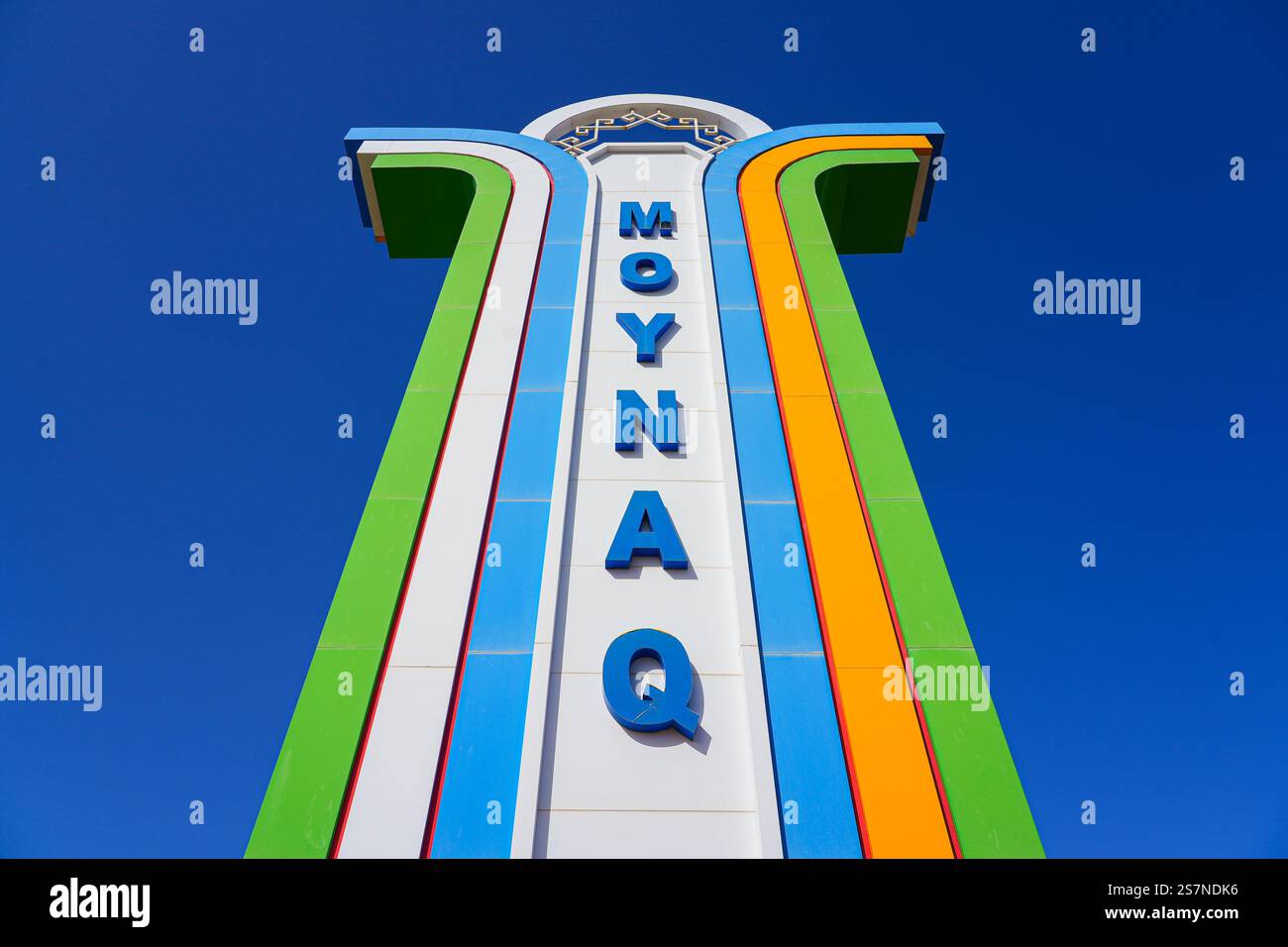 Large roadside landmark welcoming drivers to Moynaq (Muynak) featuring ...