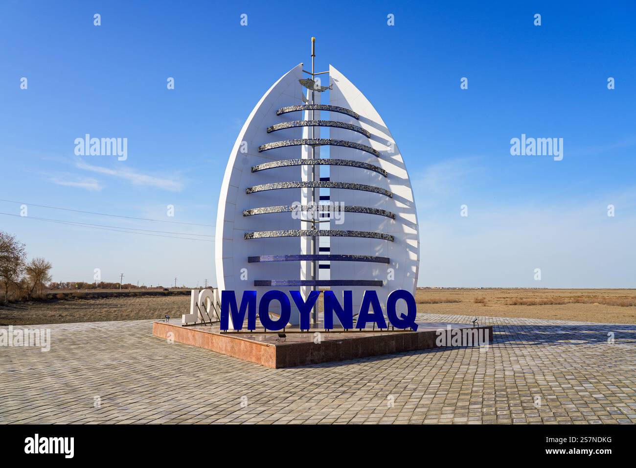 Large roadside landmark in the shape of a sail welcoming drivers to ...