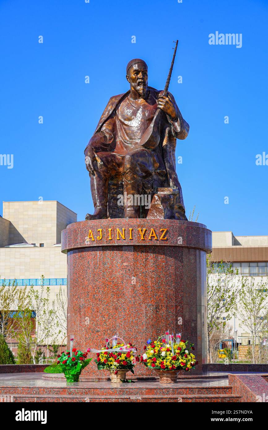 Statue of the Uzbek poet Ajiniyaz Kosibay Uli on the public square in ...