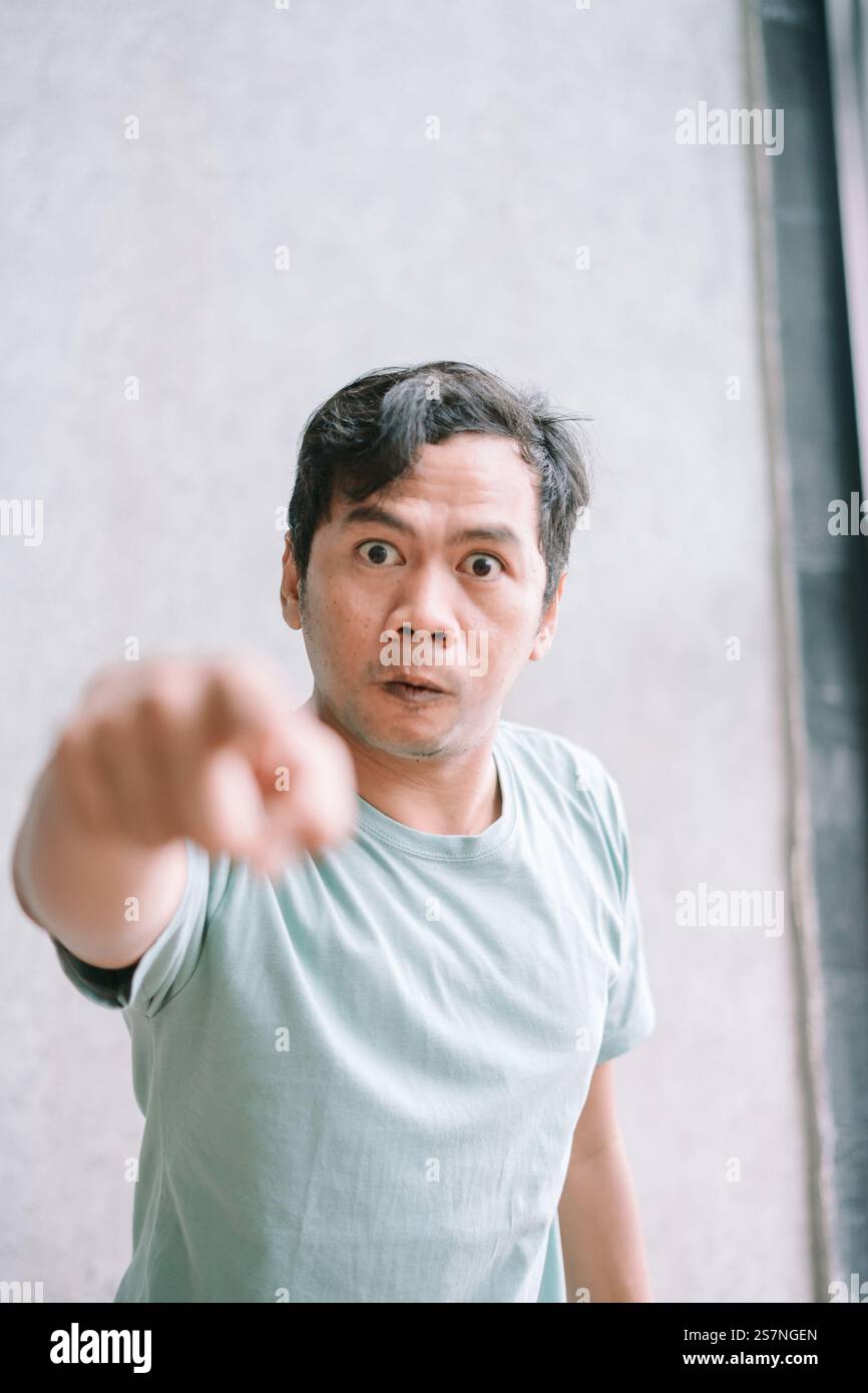 Young serious businesswoman gesturing hi-res stock photography and ...